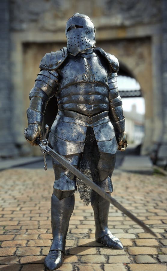 Powerful Medieval Knight Standing with a Full Suit of Armor and Holding ...