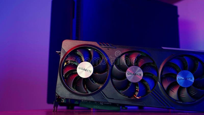 Powerful Modern GPU Video Card with Two Fans with PC Case on Background ...