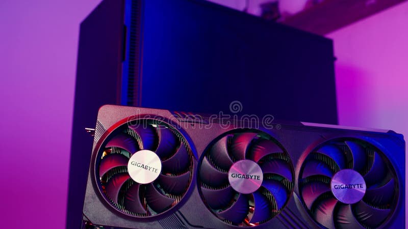 Powerful Modern GPU Video Card with Two Fans with PC Case on Background ...