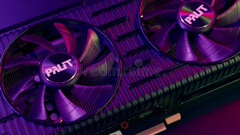 Powerful Modern GPU Video Card with Two Fans with PC Case on Background ...