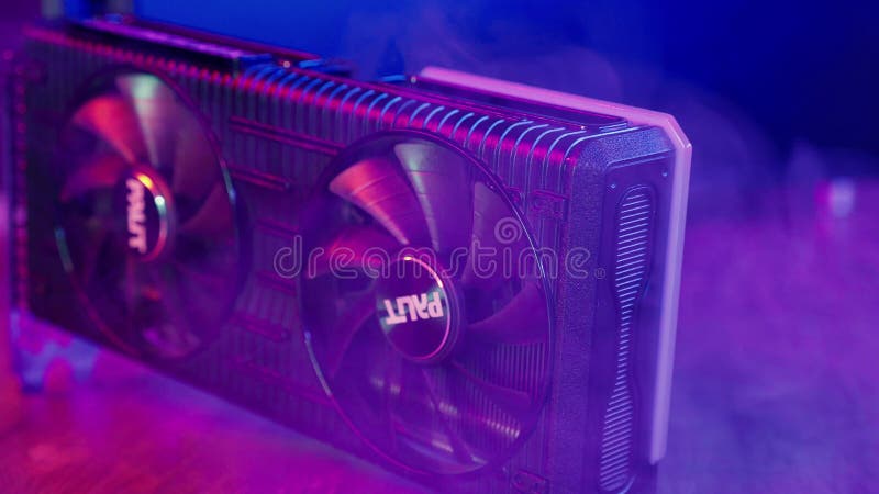 Powerful Modern GPU Video Card with Two Fans with PC Case on Background ...