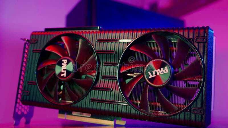 Powerful Modern GPU Video Card with Two Fans with PC Case on Background ...