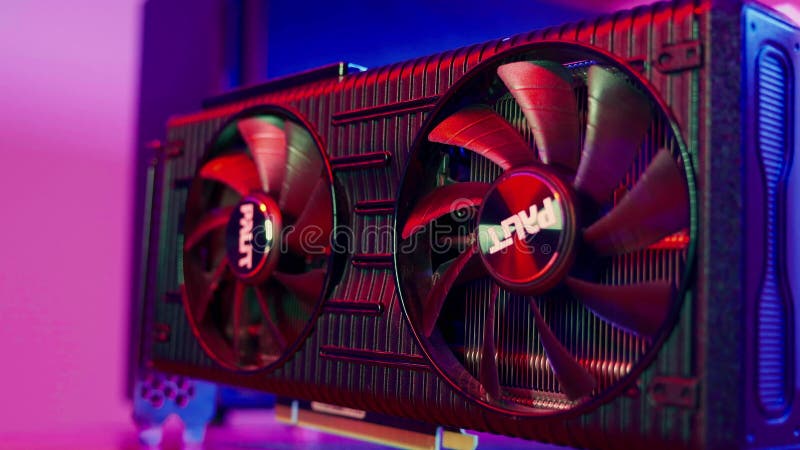 Powerful Modern GPU Video Card with Two Fans with PC Case on Background ...