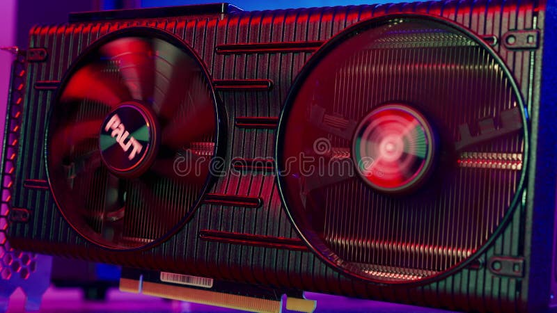 Powerful Modern Video Card with Two Fans Close Up. Technician Using ...