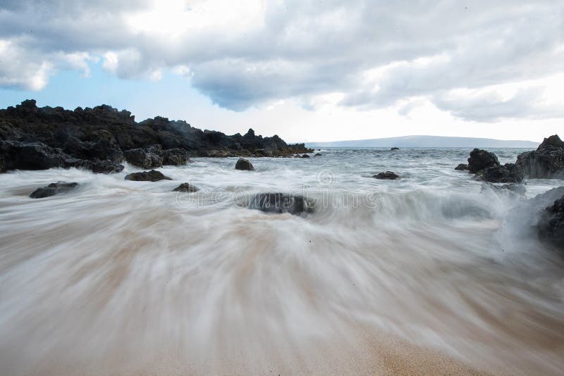 Powerful Ocean Current Rushing in To Beach Stock Image - Image of ...