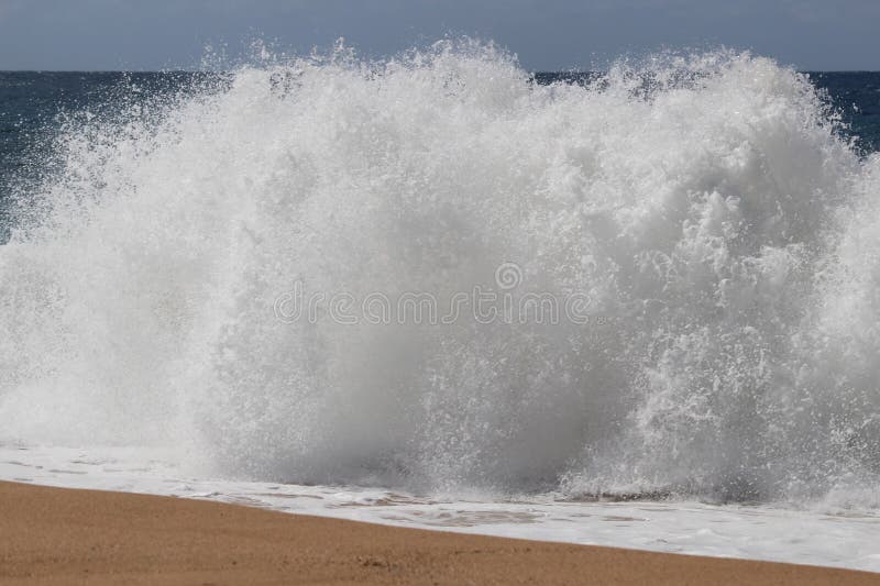 A Powerful Ocean Wave Crashing Onto the Shore Stock Photo - Image of ...