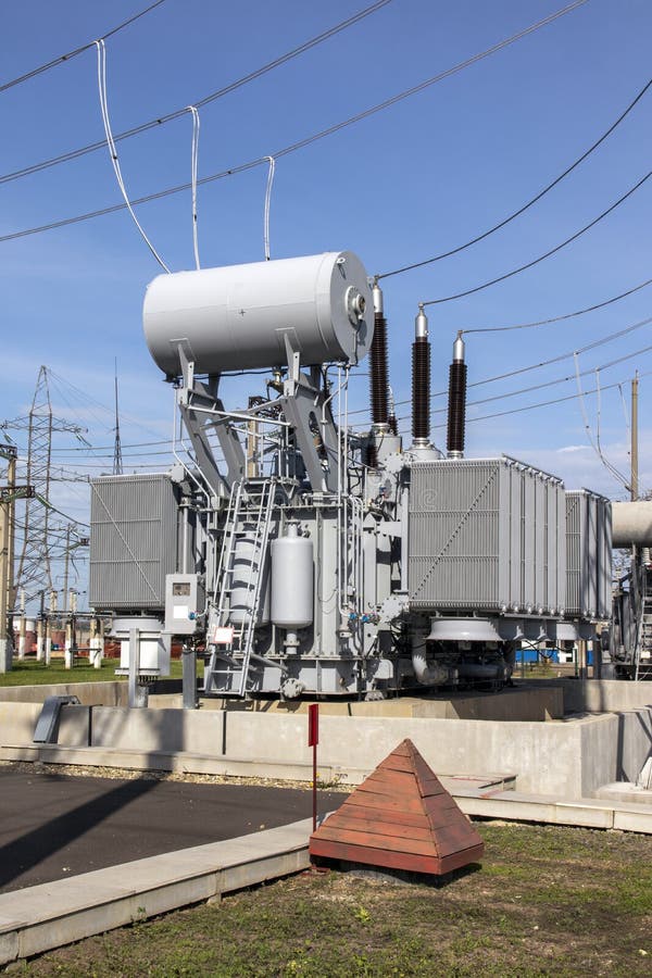 High Voltage Transformers in an Electrical Substation. Side View ...