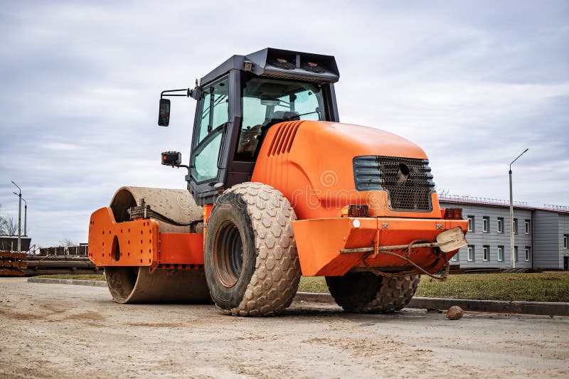 Heavy Road Roller Working on Construction Site during Overcast Day ...