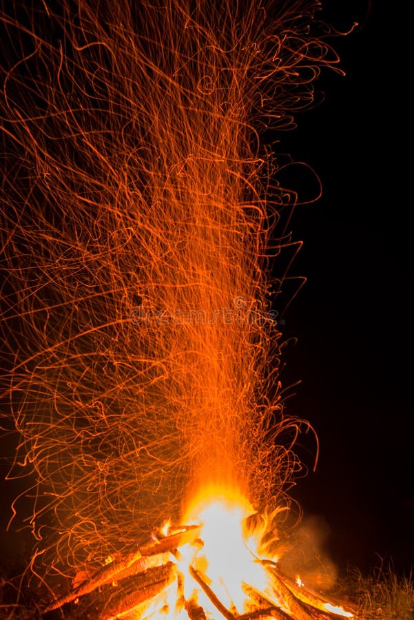 Powerful Sparks from the Burning Fire in the Night Stock Photo - Image ...
