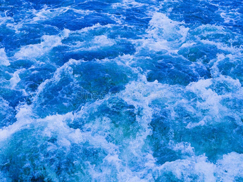 Powerful Stream of Vibrant Blue Water Stock Image - Image of sprays ...