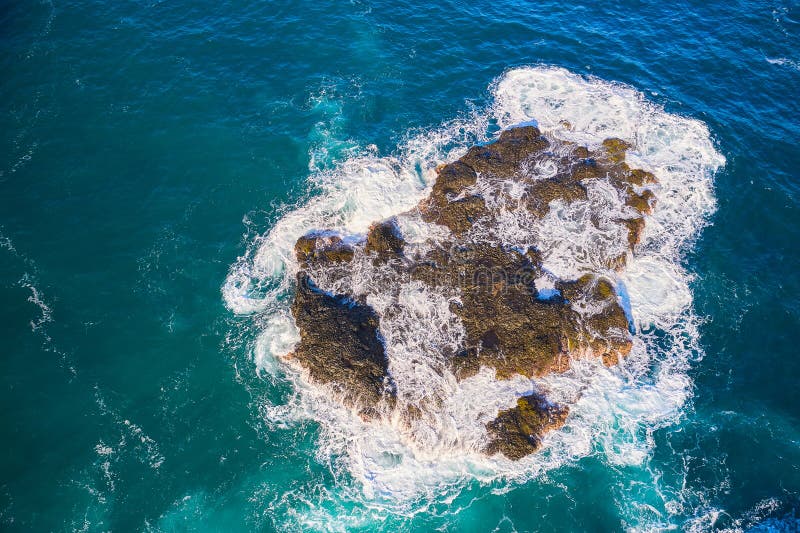 Powerful Surf Breaks on Beautiful Rocks on a Small Island Stock Image ...