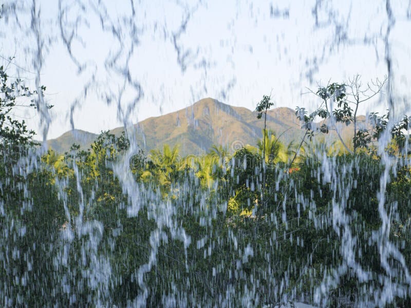 Tropical rain stock photo. Image of flowing, falls, tropical - 161431078