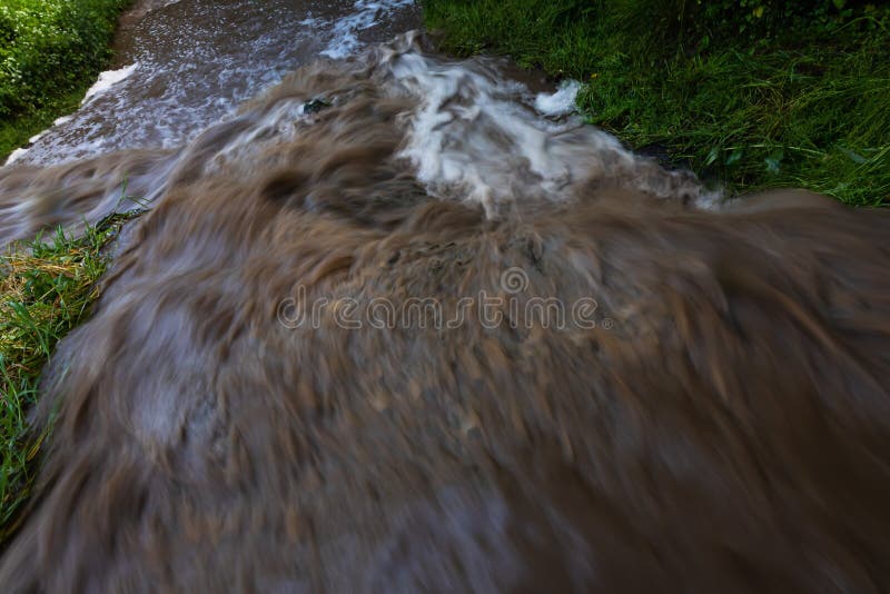 Powerful Waterfall with Dirty Water after the Rain Stock Photo - Image ...