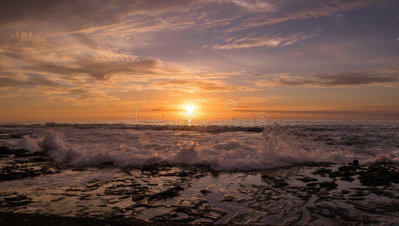 Powerful Sunrise At The Rocky Shore Stock Photo - Image of energy ...