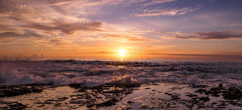 Powerful Sunrise At The Rocky Shore Stock Photo - Image of energy ...