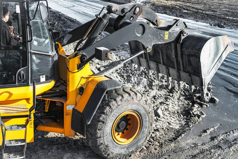 Powerful Wheel Loader or Bulldozer at the Construction Site. Loader ...