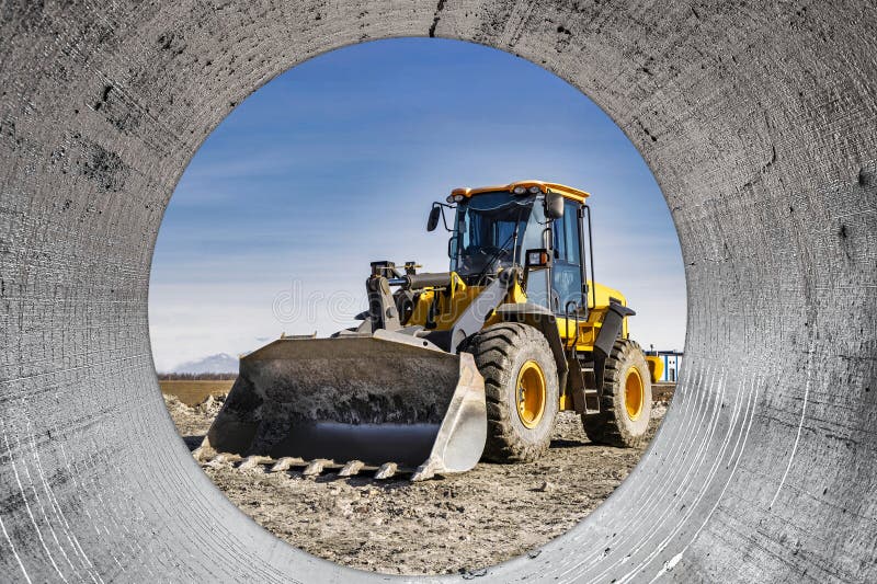 Powerful Wheel Loader or Bulldozer Working on a Quarry or Construction ...