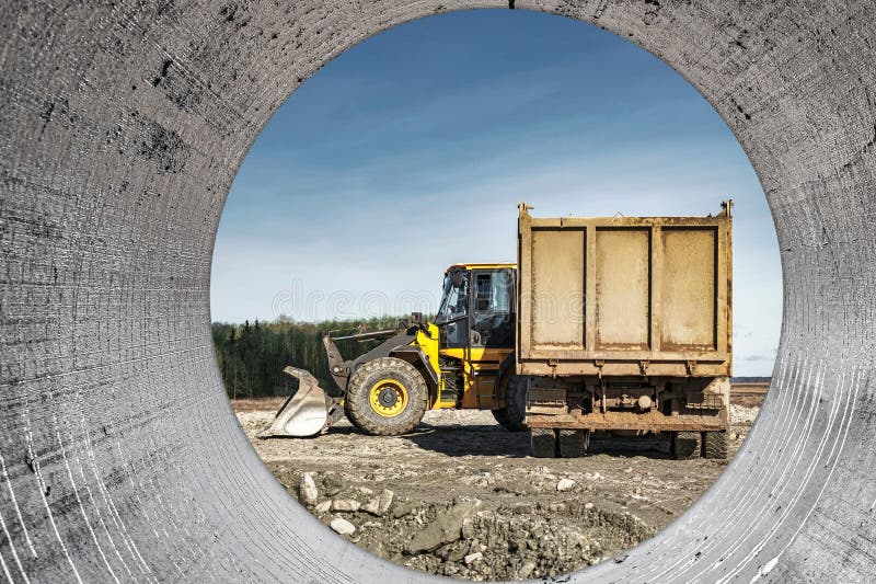 Powerful Wheel Loader or Bulldozer Working on a Quarry or Construction ...