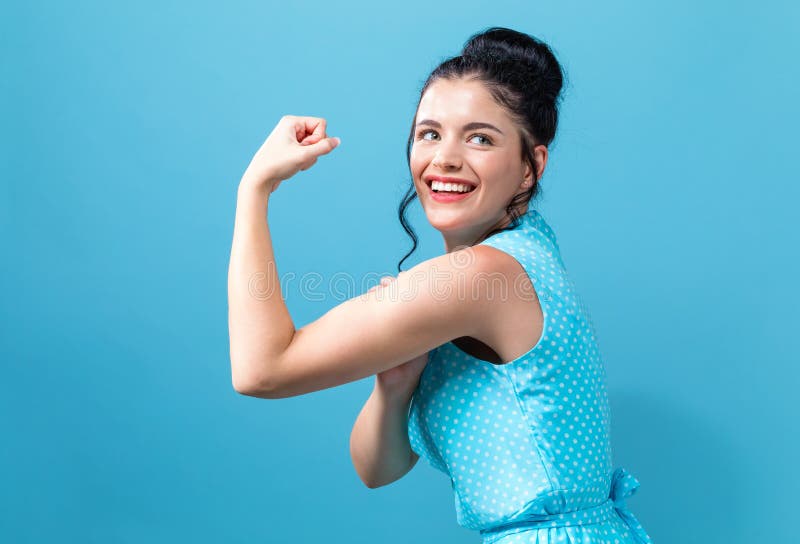 Powerful Young Woman in Success Pose Stock Image - Image of powerful ...