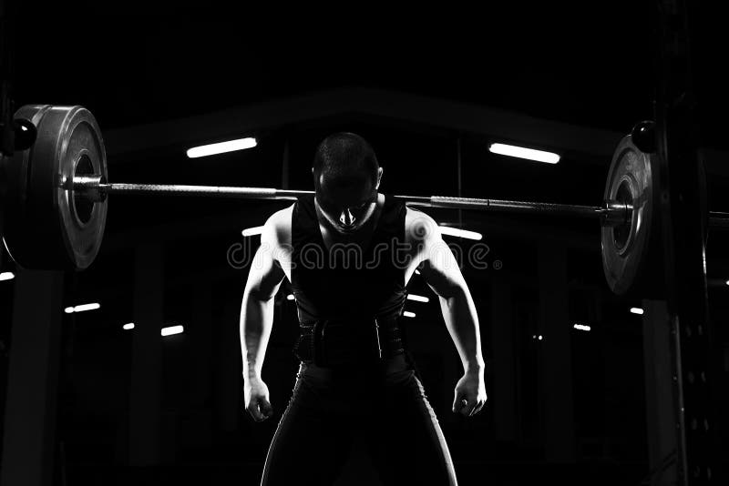 Powerlifter Doing Exercise for Legs with Barbell Stock Photo - Image of ...