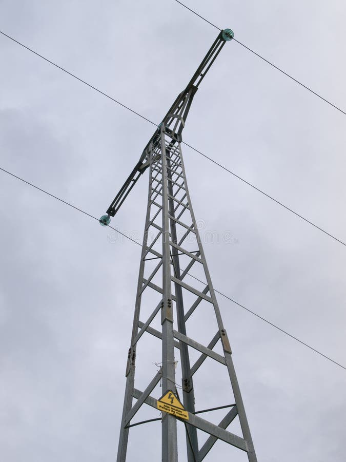 Powerline Pole with Three Cables Over a Cloudy Background Stock Image ...