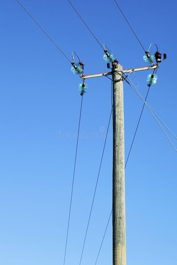 Powerline on wooden pillar stock photo. Image of pillar - 32137020