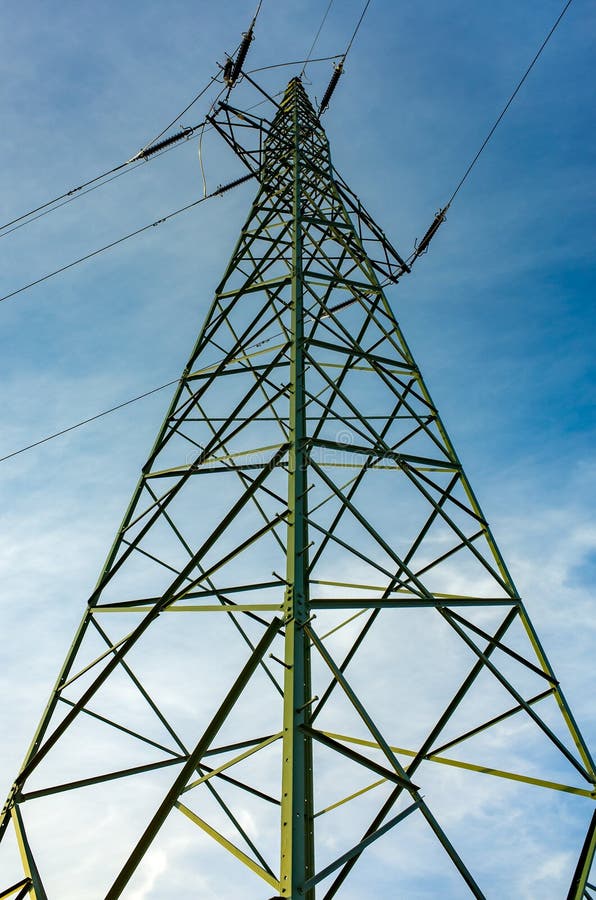 Powerlines on the field stock photo. Image of industry - 64459884