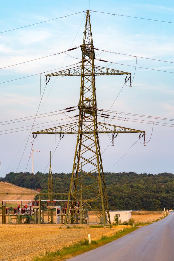 Powerlines on the field stock photo. Image of landscape - 60569668