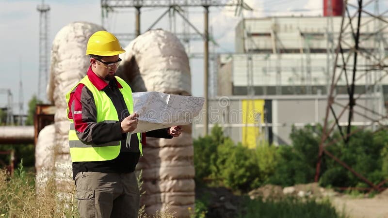 Powerman with Scheme of Works on Power Station Stock Video - Video of ...