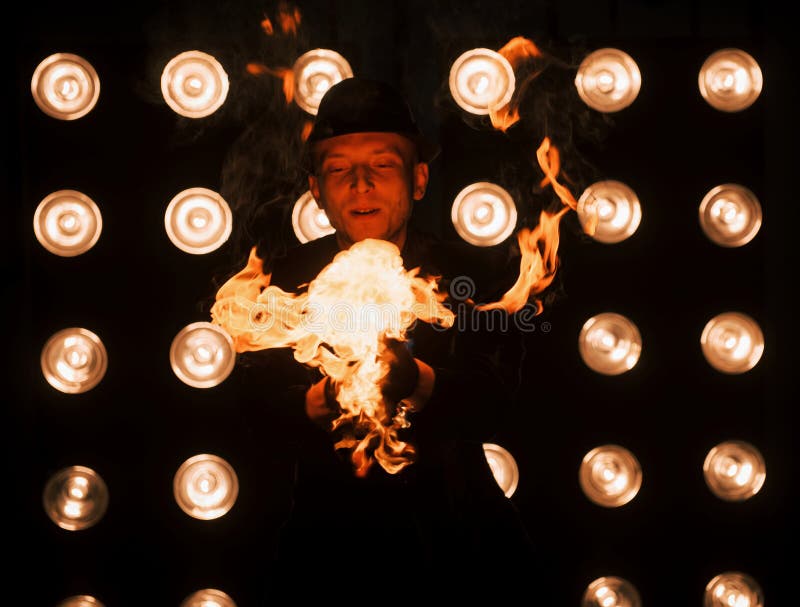Magician with fire stock photo. Image of adult, card - 38523406