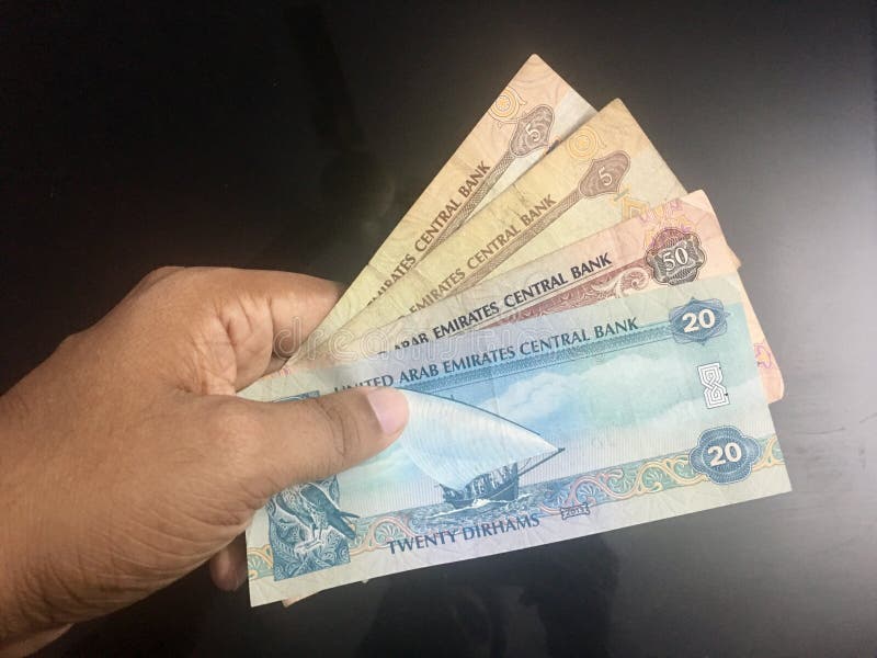 PPaying United Arab Emirates Dirham Currency Notes Stock Image - Image ...