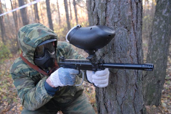 Pplayer in paintball. stock photo. Image of splotch, thrilling - 1384202