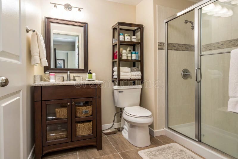 Room Bathroom Interior with Single Vanity and Over-the-toilet Storage ...