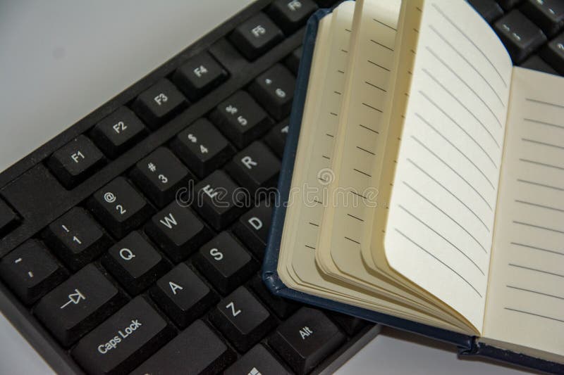 Practical Combination of Black Keyboard and Notebook Stock Photo ...