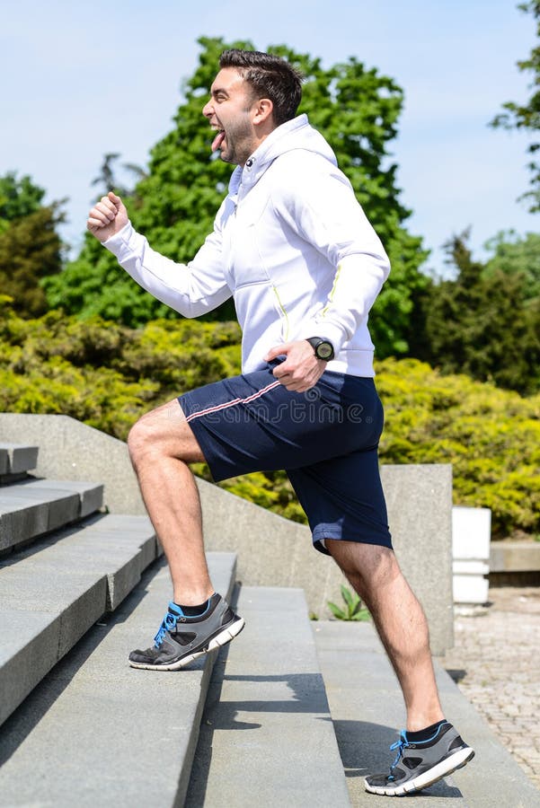 Practice - Close Up of Young Man Running Up the Stairs Stock Image ...