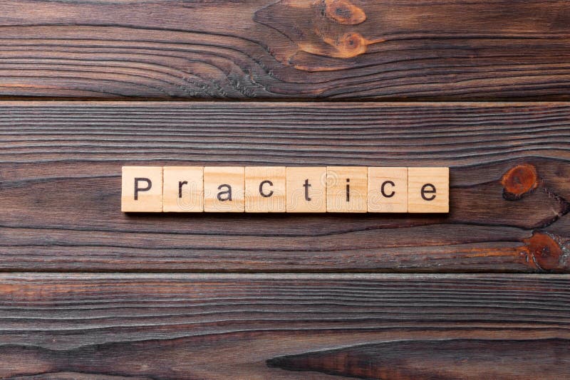 Practice Word Written on Wood Block. Practice Text on Table, Concept ...