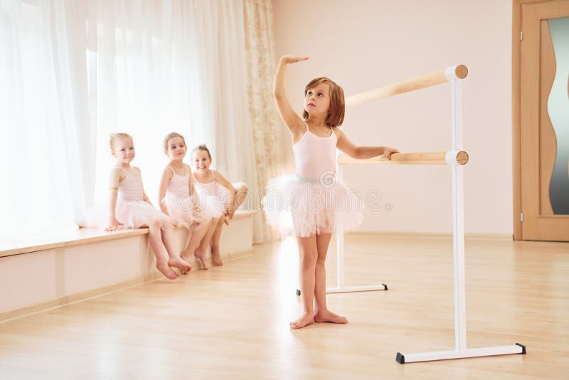 Practicing Dance Moves. Little Ballerinas Preparing for Performance ...