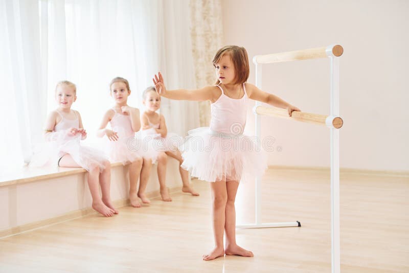 Practicing Dance Moves. Little Ballerinas Preparing for Performance ...