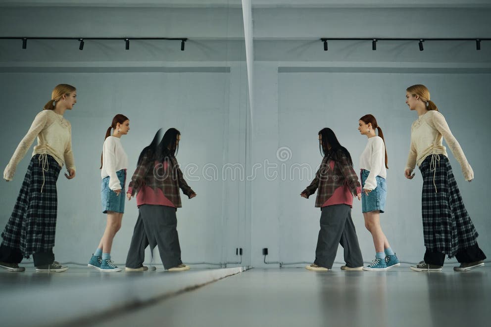 Practicing Group Dance Moves in Studio with Mirror Reflection Stock ...