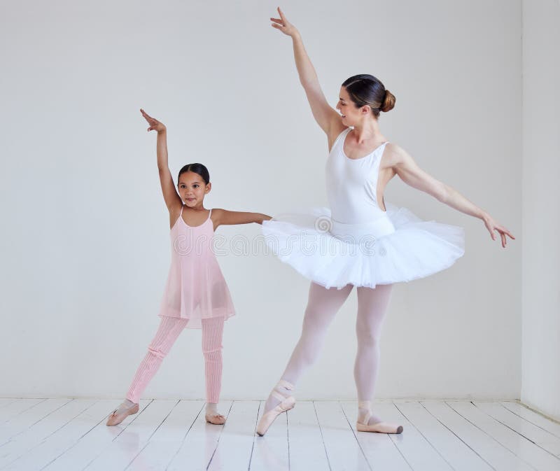 Practicing with Her Teacher. a Little Girl Practicing Ballet with Her ...