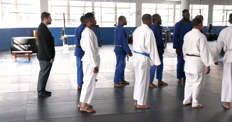 Practicing Judo, Group of Men in Uniforms Standing in Training Hall ...