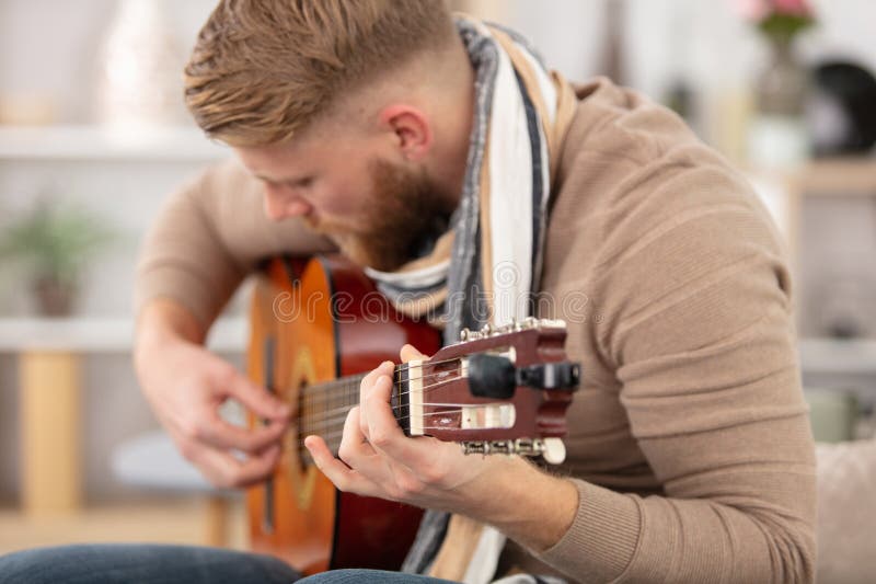 Practicing in Playing Guitar Handsome Young Men Playing Guitar Stock ...