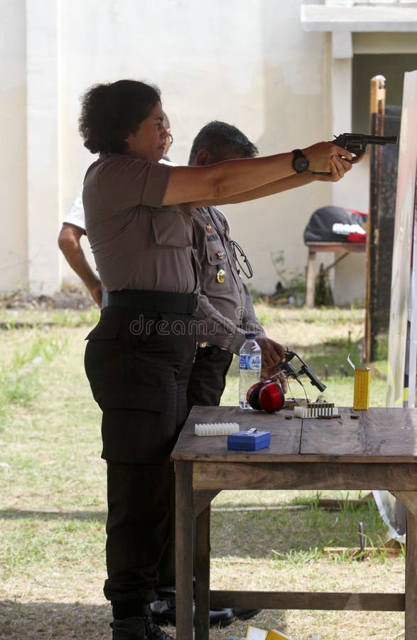 Man Practicing at Shooting Range Firing Gun Stock Photo - Image of suit ...