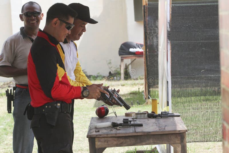 Practicing shooting editorial photo. Image of java, city - 76972686