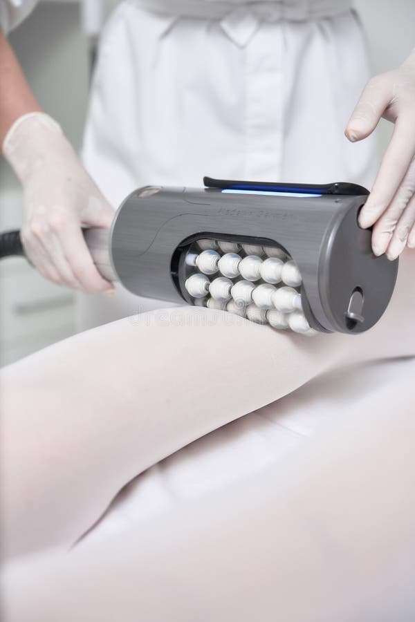 Innovative Body Contouring Treatment Being Administered at a Modern ...