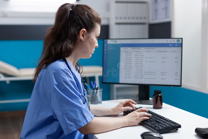 Practitioner Specialist Nurse Analyzing Medical Examination Using ...