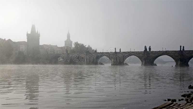 Prague - Charles Bridge in the Fog Stock Photo - Image of statuary ...