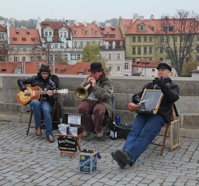 Trio of Street Musicians. on the Charles Bridge in the Historical ...