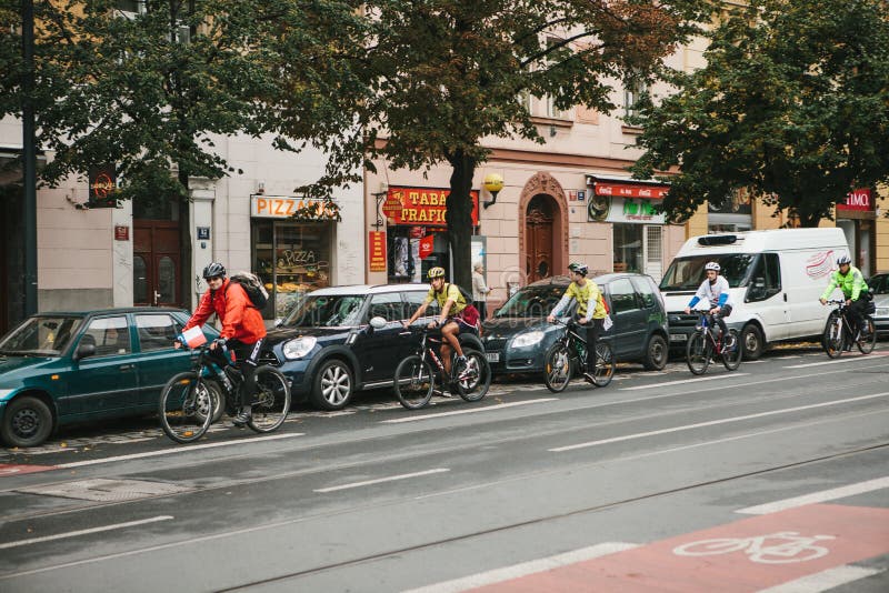 Prague, September 24, 2017: Unknown People Cross the Street on Bicycles ...