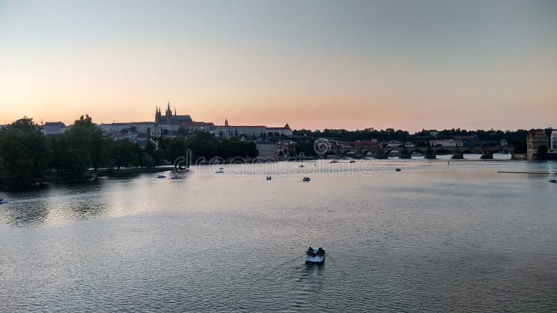 Prague sunset stock image. Image of boats, sunset, channels - 118800125